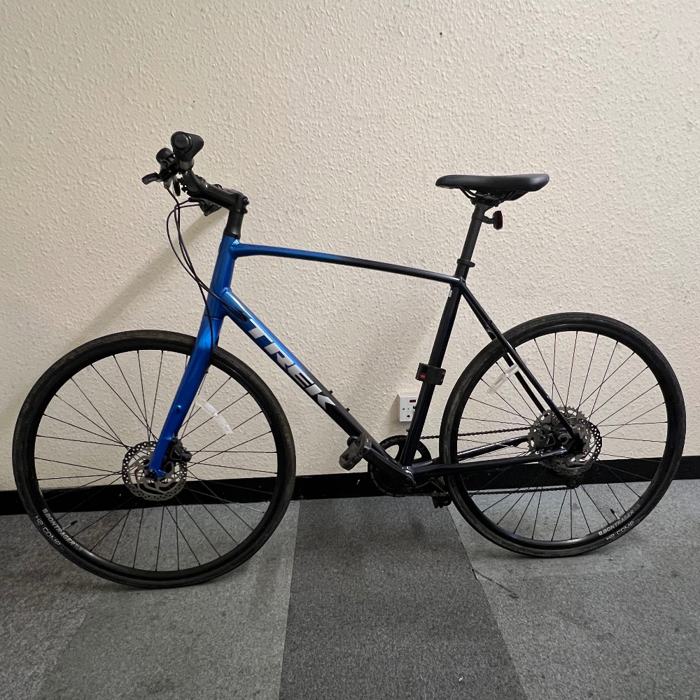 Pre-owned TREK FX3 3 DISC HYBRID BIKE ALPINE BLUE - Own4Less